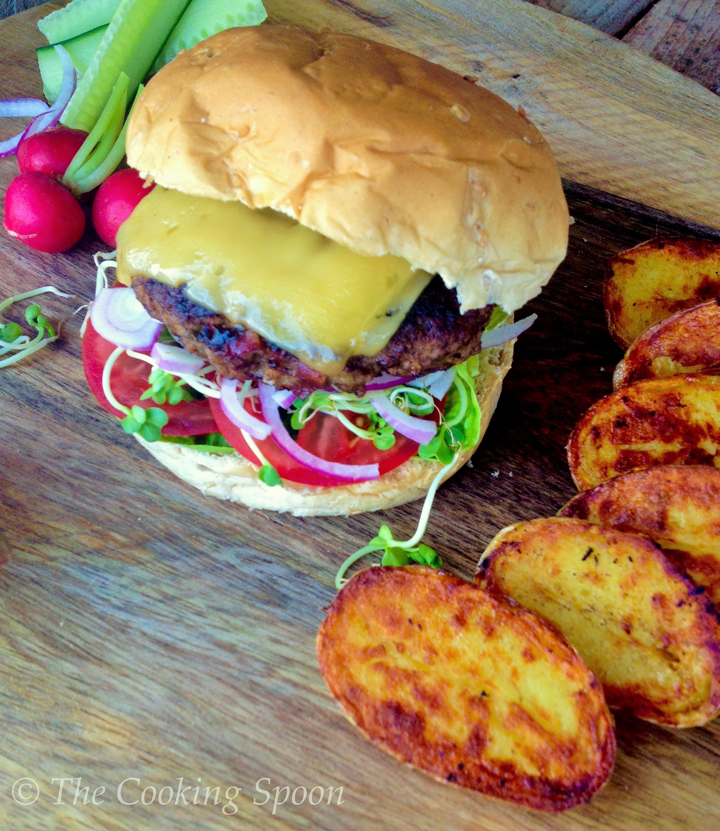 Deluxe Beef burger filled with Onions and Crispy Bacon, topped with ...